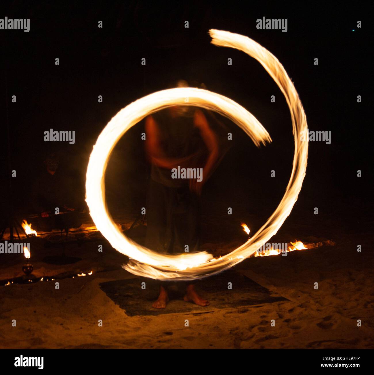 Fire show on the beach at night in Phuket, Thailand Stock Photo - Alamy