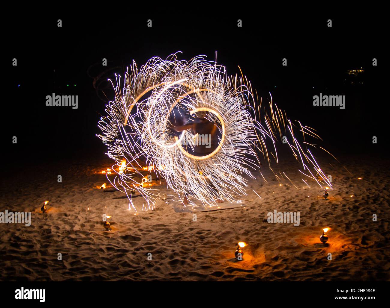 Fire show on the beach at night in Phuket, Thailand Stock Photo - Alamy