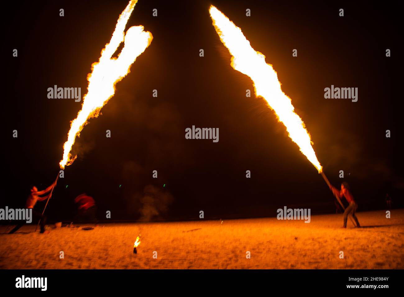 Fire show on the beach at night in Phuket, Thailand Stock Photo - Alamy