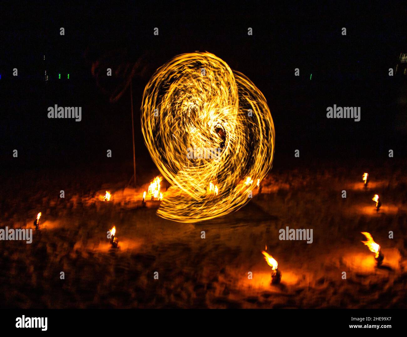 Fire show on the beach at night in Phuket, Thailand Stock Photo - Alamy