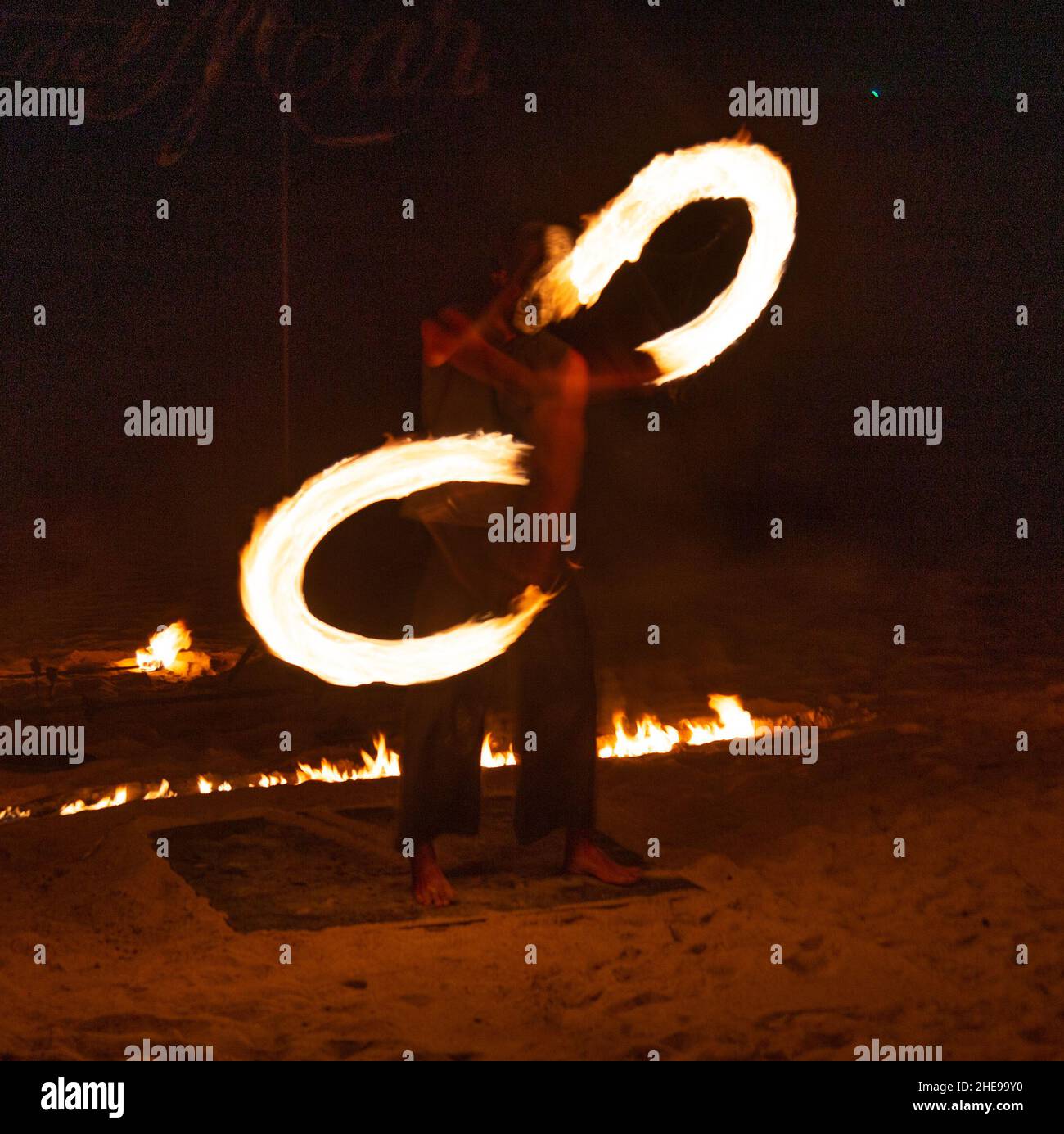 Fire show on the beach at night in Phuket, Thailand Stock Photo - Alamy