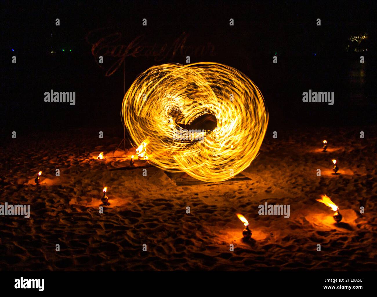 Fire show on the beach at night in Phuket, Thailand Stock Photo - Alamy