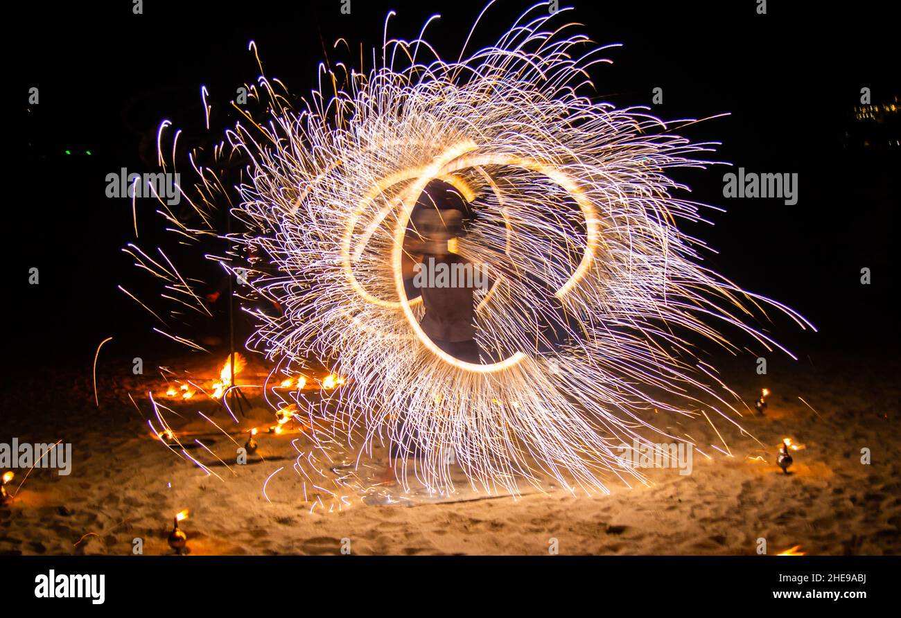 Fire show on the beach at night in Phuket, Thailand Stock Photo - Alamy