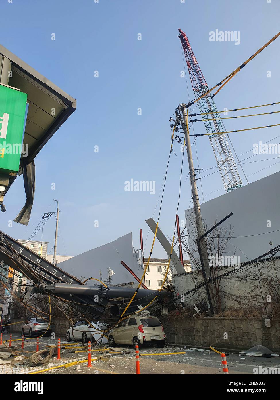 10th Jan, 2022. Construction machine collapses This photo taken Jan. 10 ...