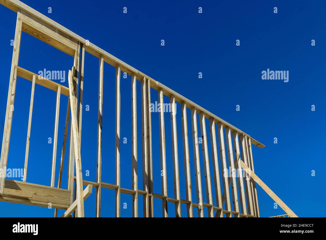 Wood building house construction with wood framing Stock Photo - Alamy