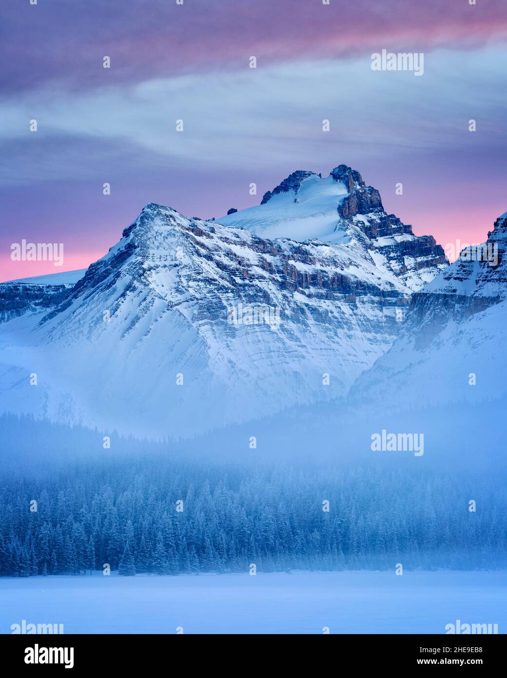 Canada, Alberta, Banff National Park, Dusk over Mount Hector and foggy ...