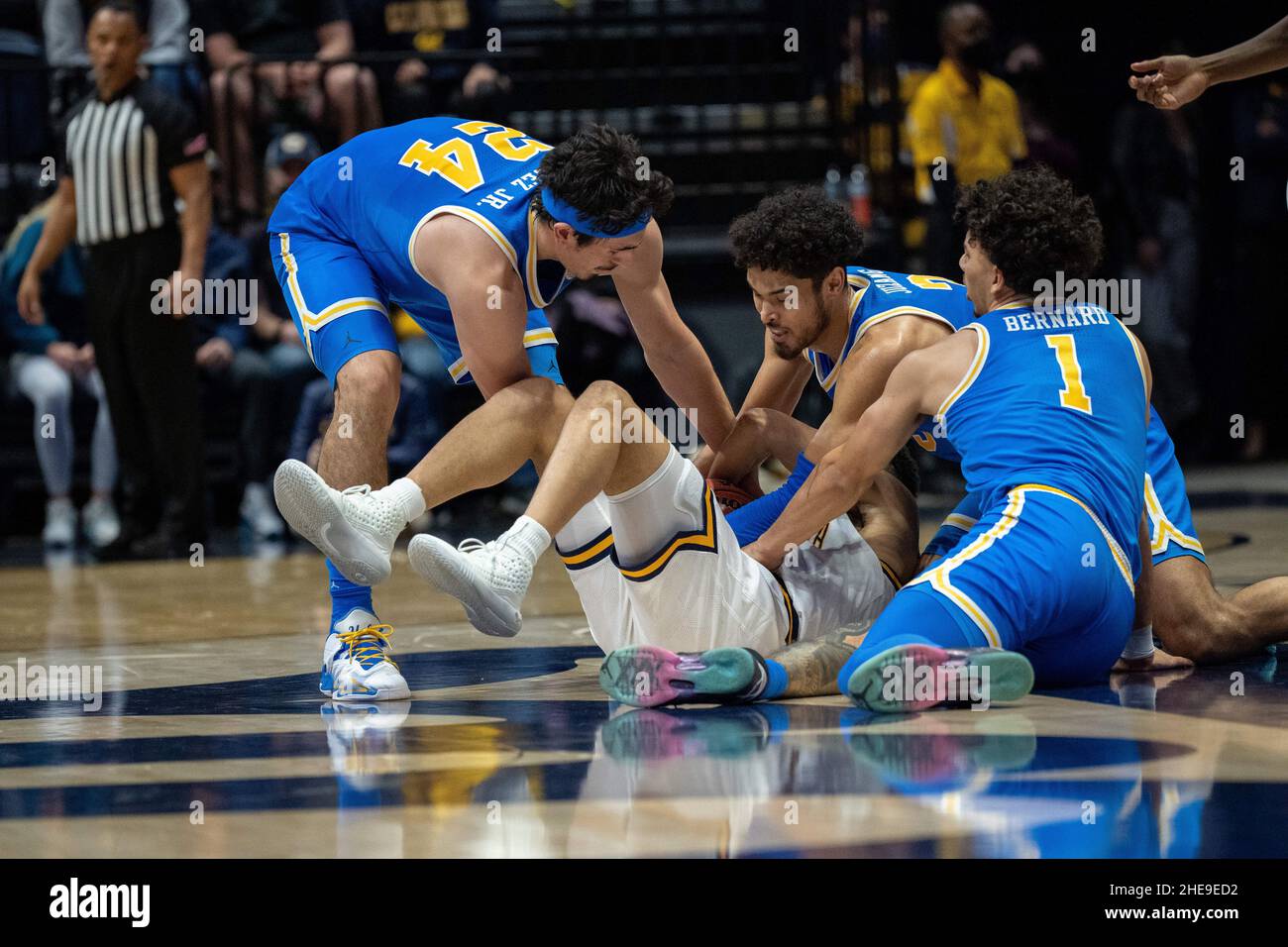 California guard Jordan Shepherd (31) and UCLA guard Jaime Jaquez Jr. (24) and UCLA guard Jules ...