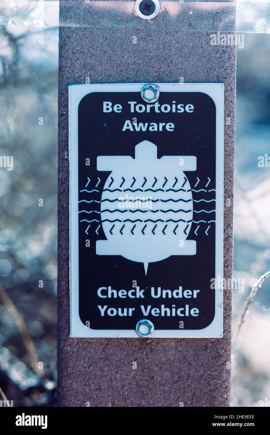 Be aware of tortoise warning sign Stock Photo - Alamy