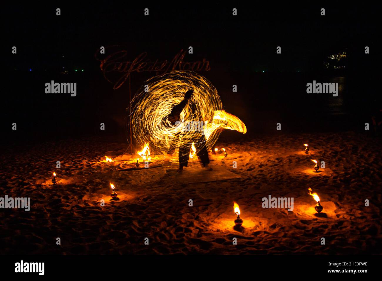 Fire show on the beach at night in Phuket, Thailand Stock Photo - Alamy