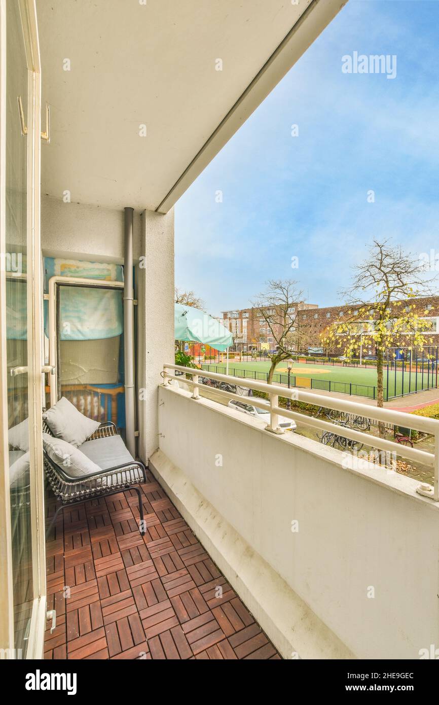 Balcony of a beautiful house in the daytime Stock Photo - Alamy