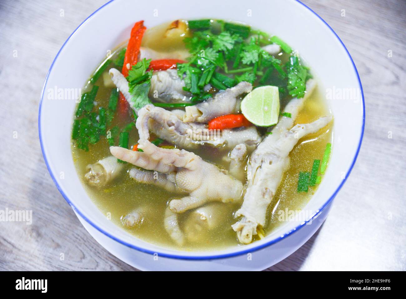 sour and spicy chicken feet soup, chicken feet soup bowl Stock Photo ...