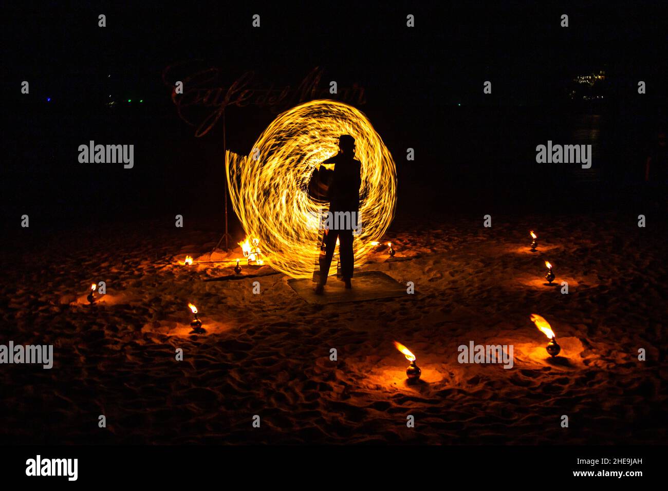 Fire show on the beach at night in Phuket, Thailand Stock Photo - Alamy