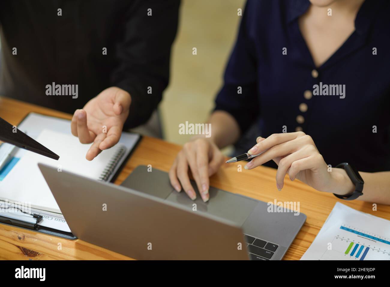 Two of colleagues worker doing their project presentation slide ...