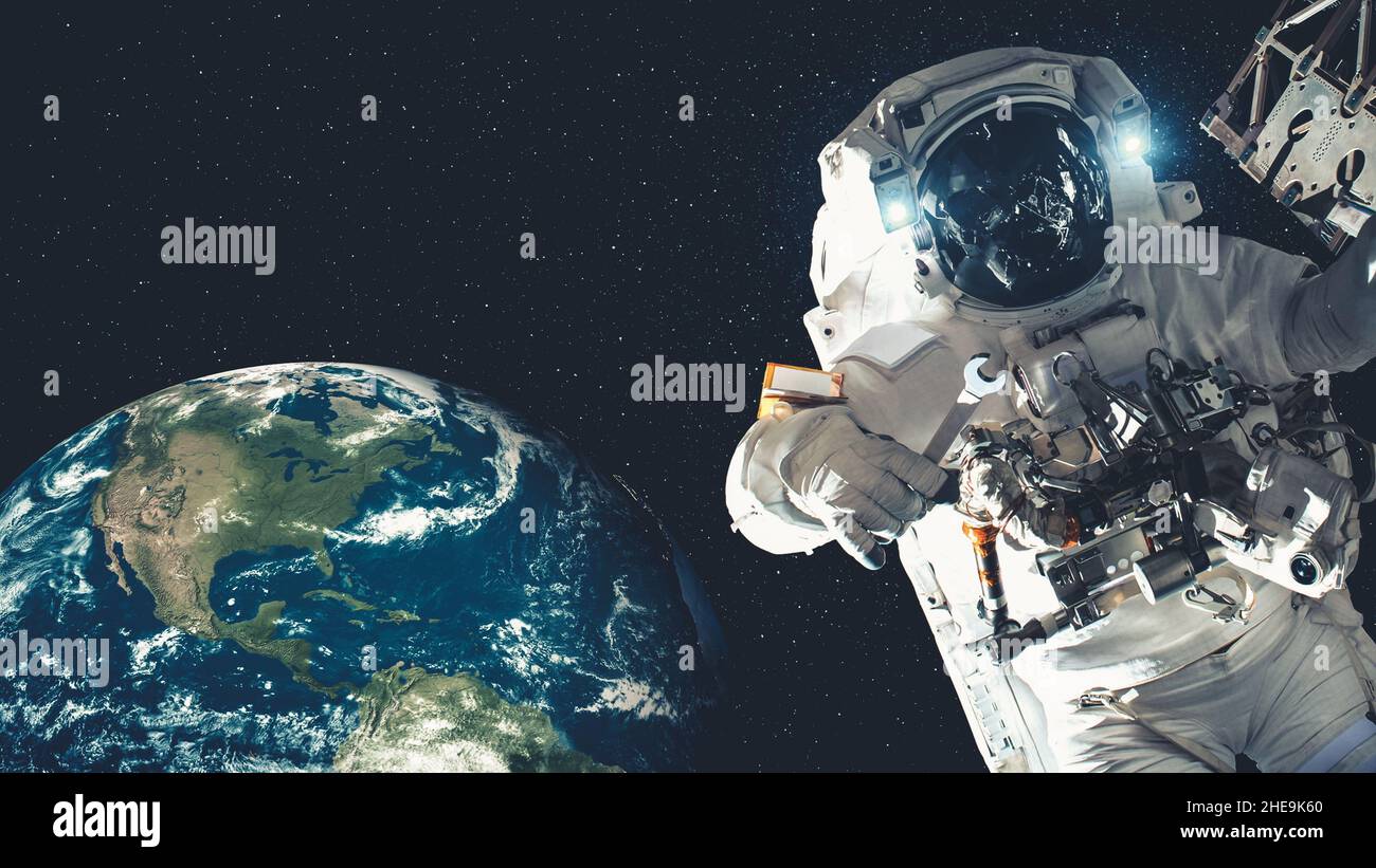 Astronaut spaceman do spacewalk while working for spaceflight mission ...