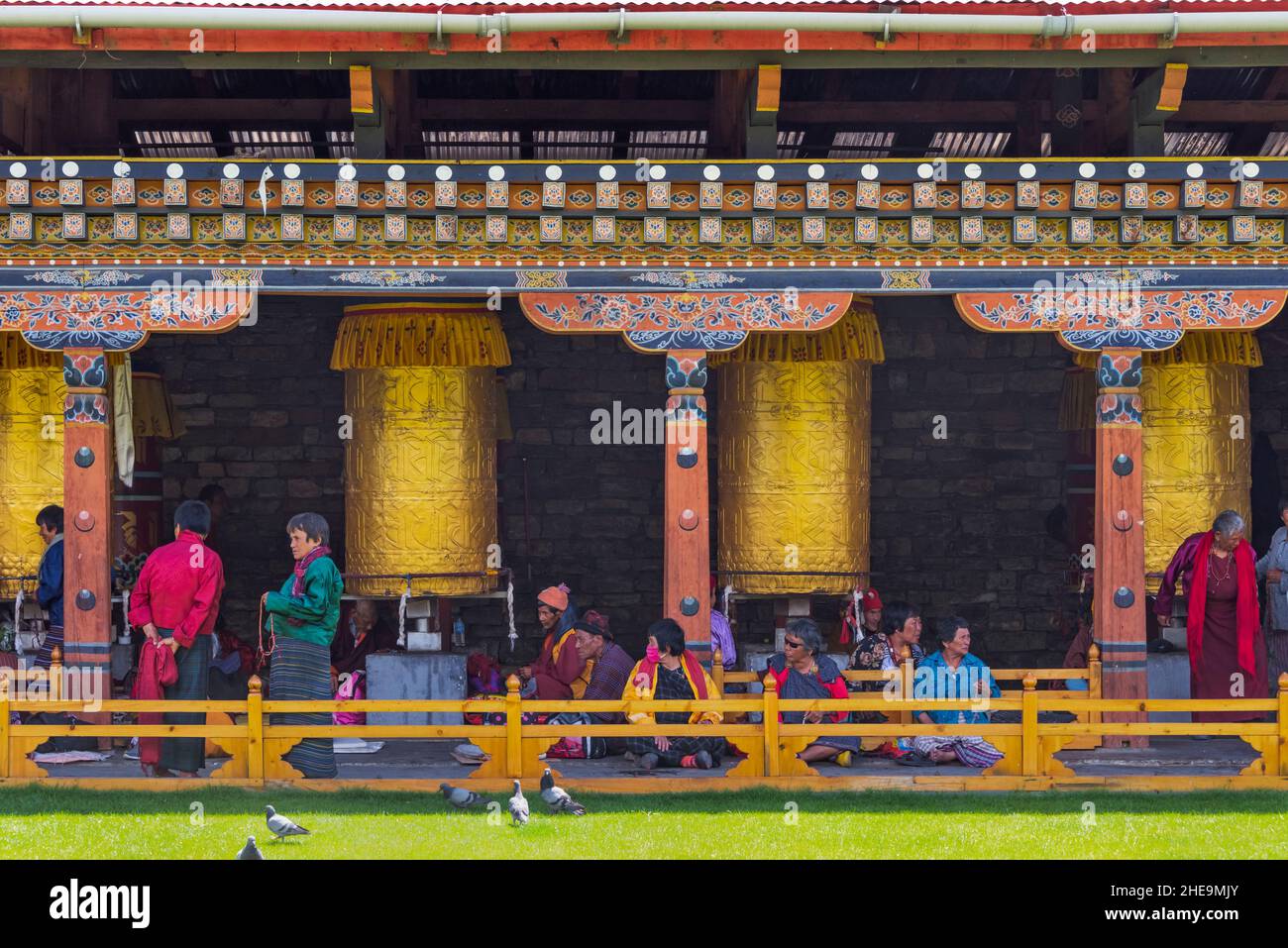 Pilgrims with prayer wheels at National Memorial Chorten, Thimphu ...