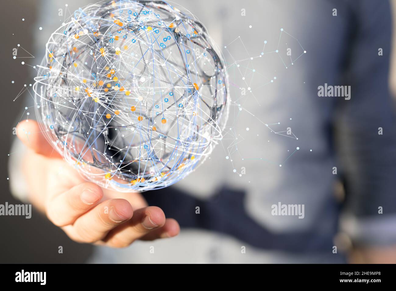 Shallow focus of human hands holding an interconnected globe icon ...