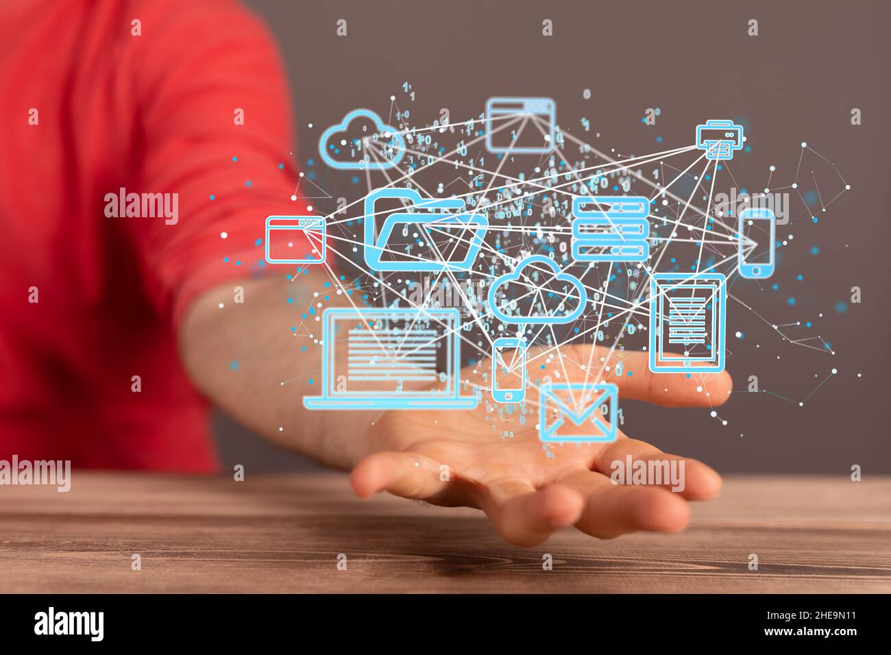 Shallow focus of a human hand holding various social icons, Internet ...