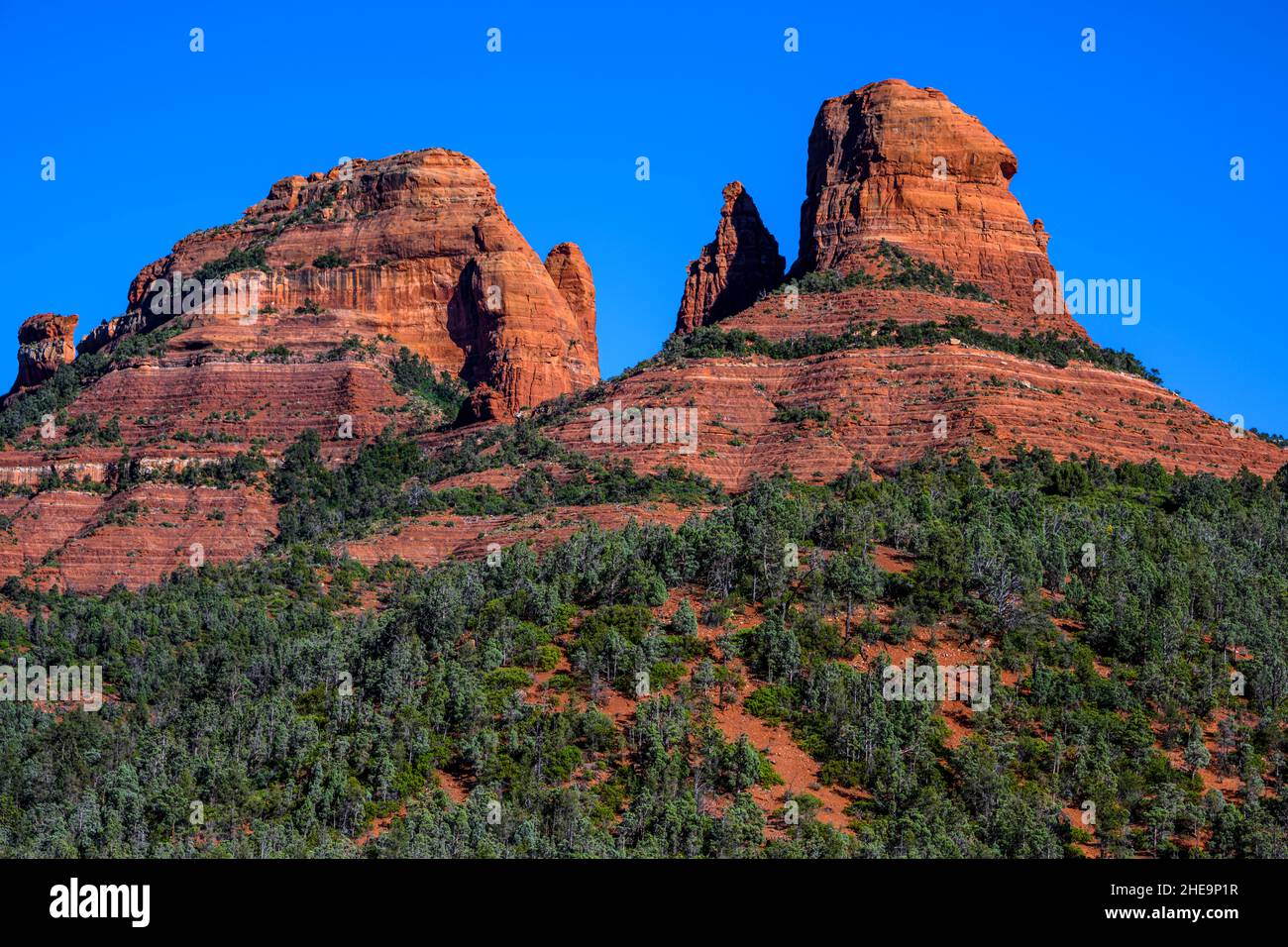 Rock formations surrounding Sedona, Arizona, US. Prominent orange butte ...