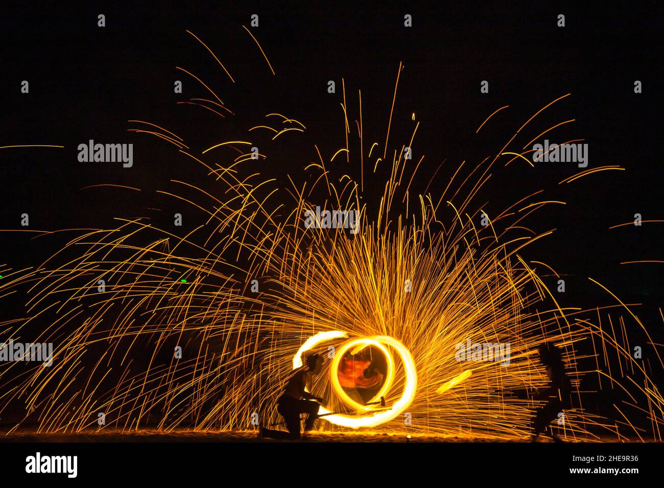 Fire show on the beach at night in Phuket, Thailand Stock Photo - Alamy