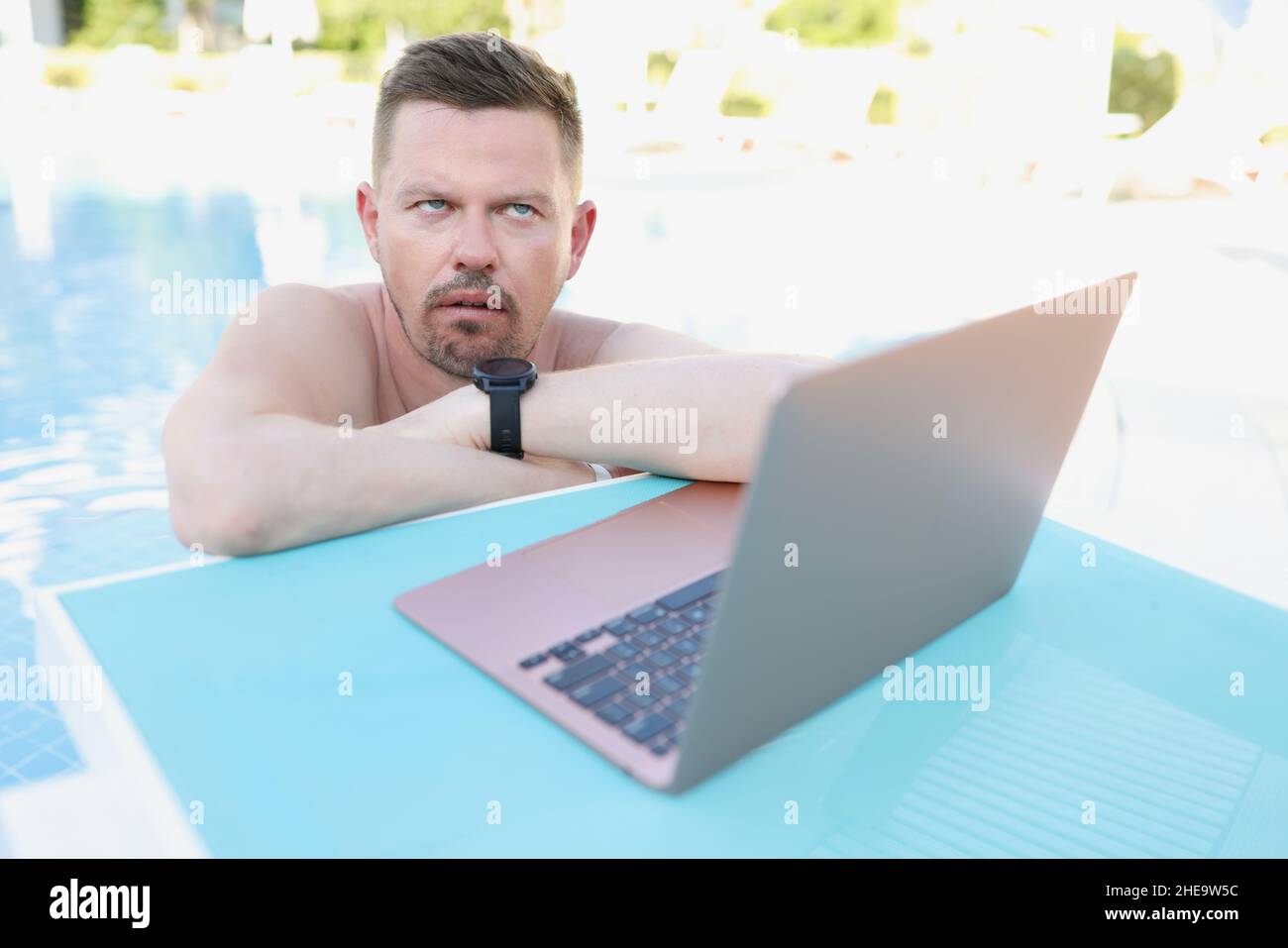 Laptop by the pool hi-res stock photography and images - Alamy