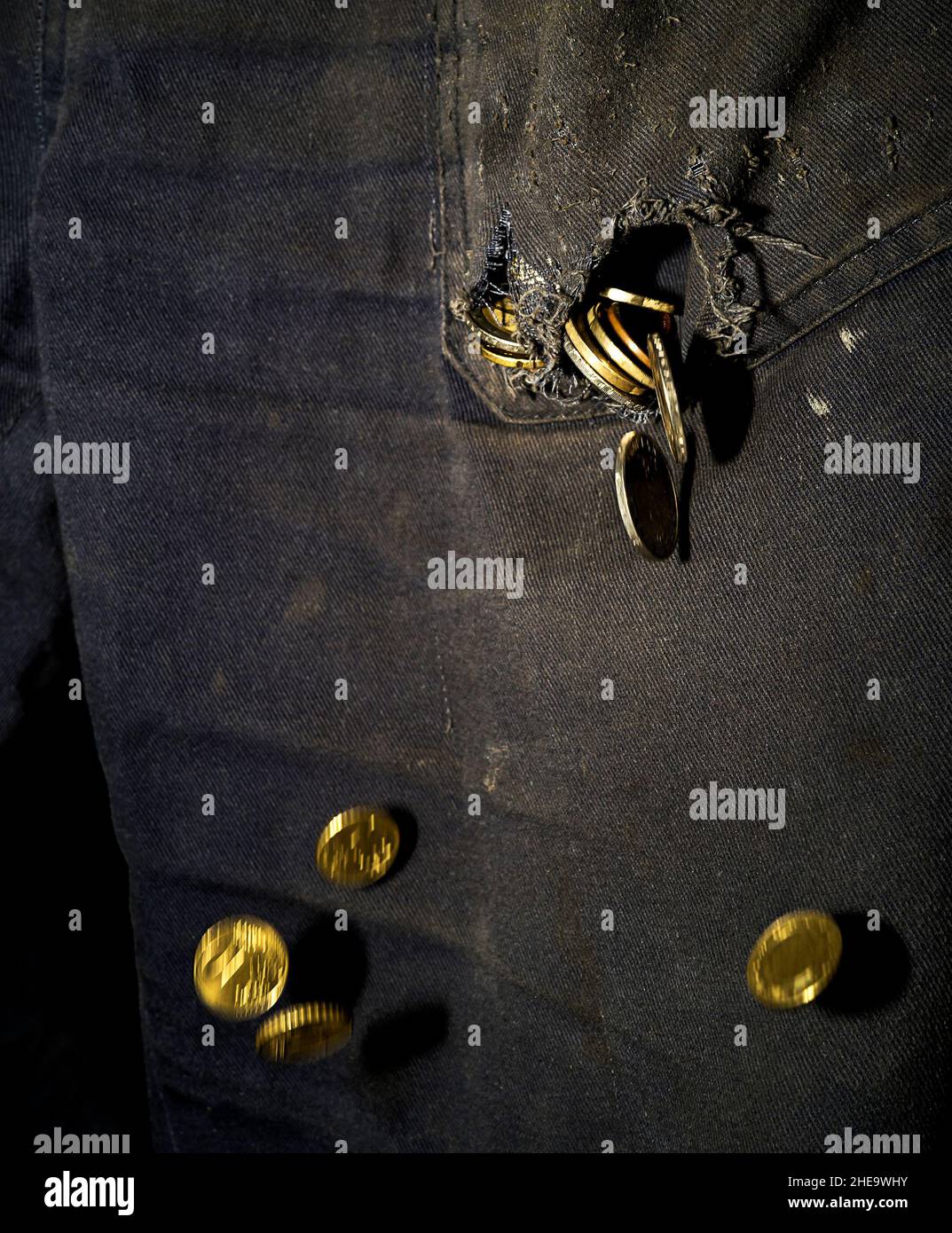 Coins falling down hole hi-res stock photography and images - Alamy