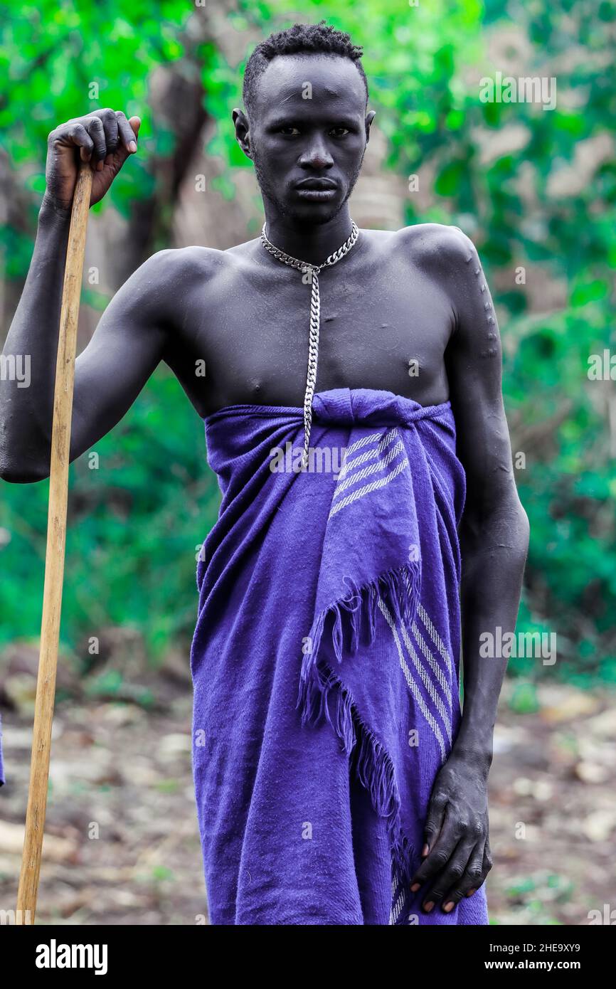 Omo River Valley, Ethiopia, November 2020, Men in traditional outfits ...