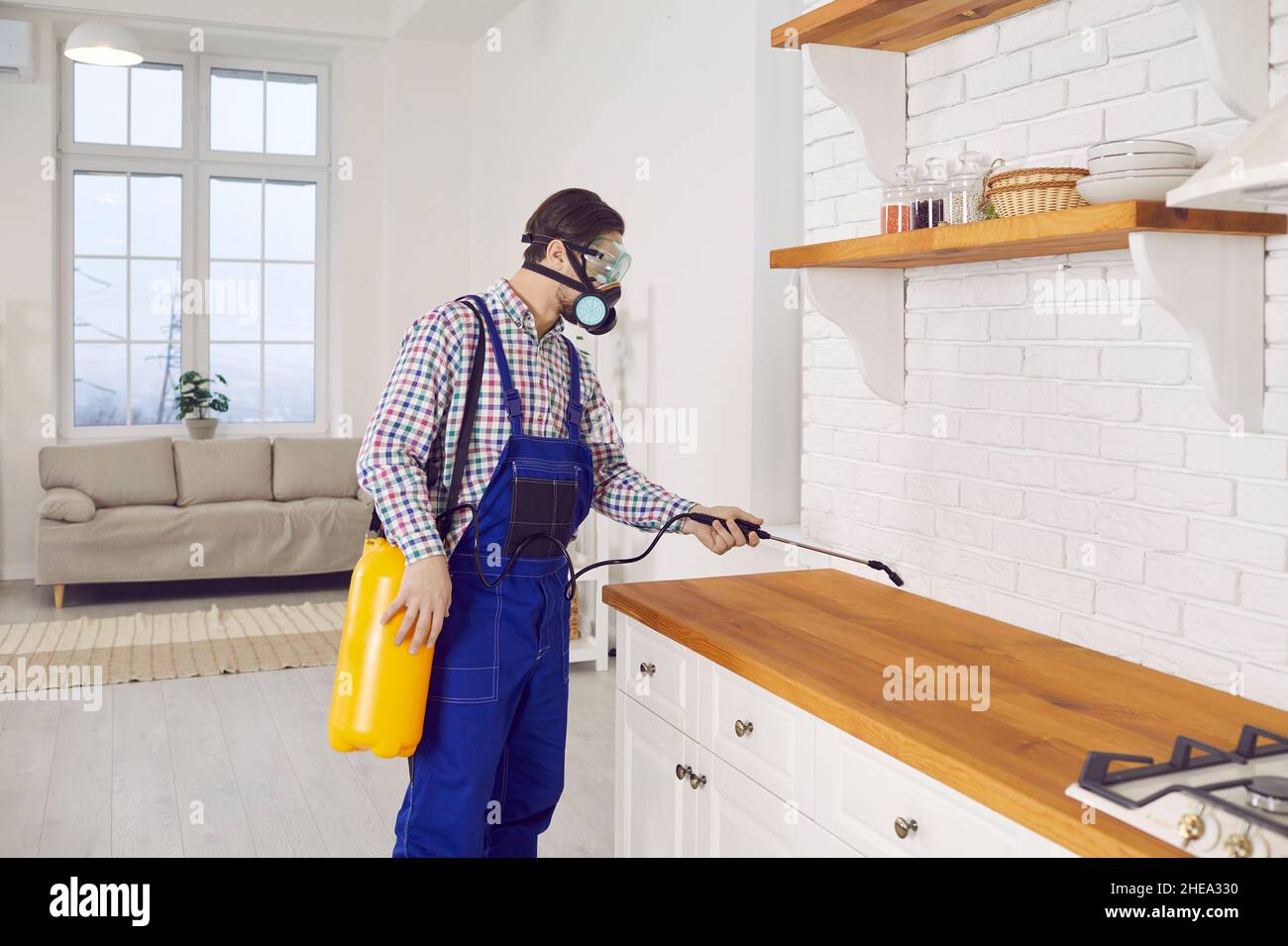 Spraying pesticide gas mask hi-res stock photography and images - Alamy