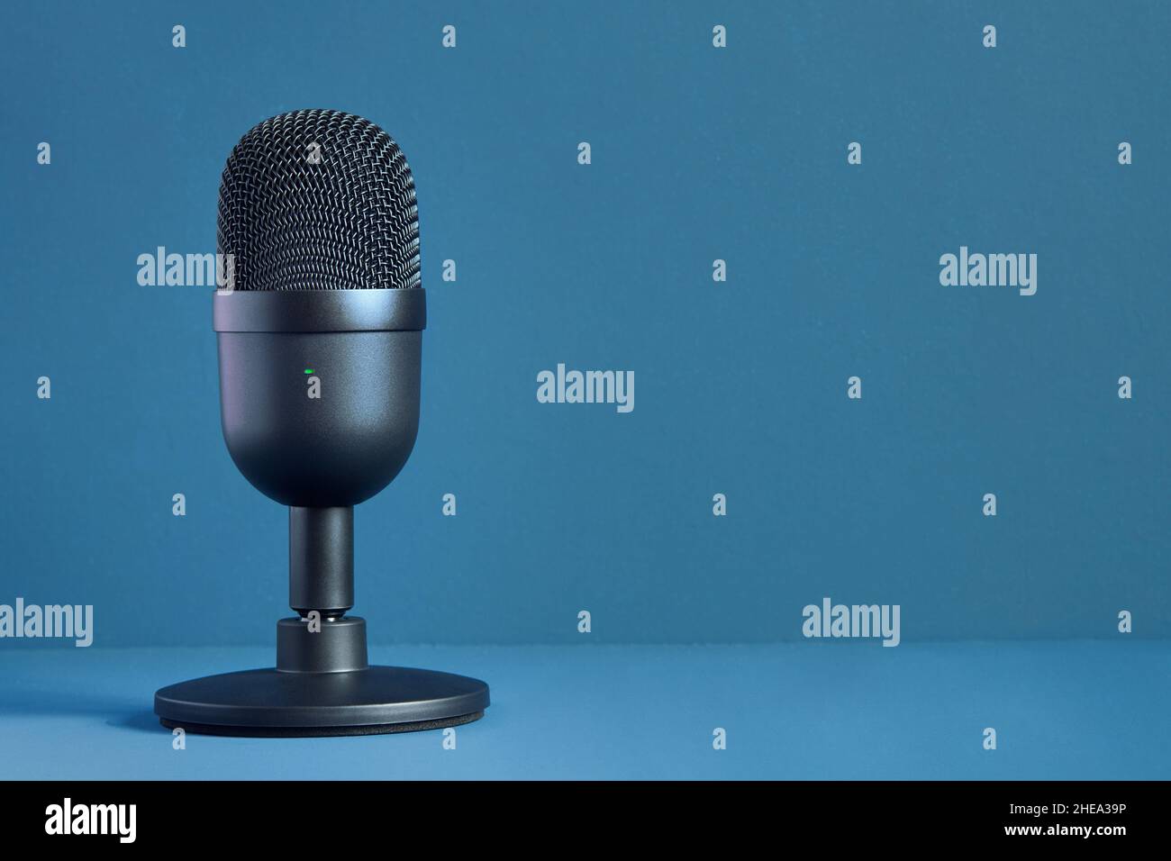 Minimalist image of a modern and elegant black design microphone for ...