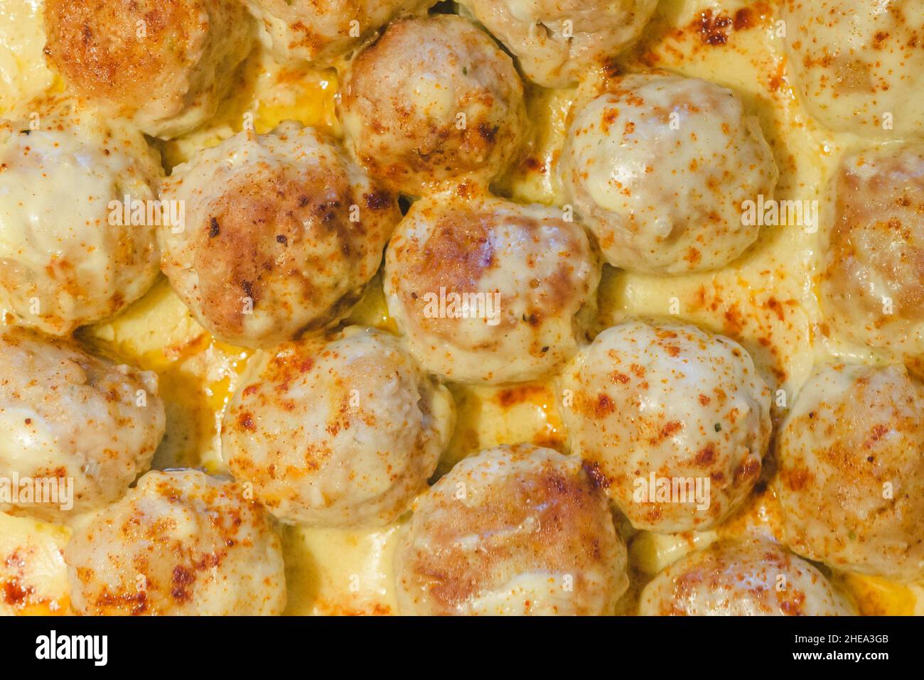 Swedish meatballs in a creamy white sauce recipe. Meatballs close up on ...