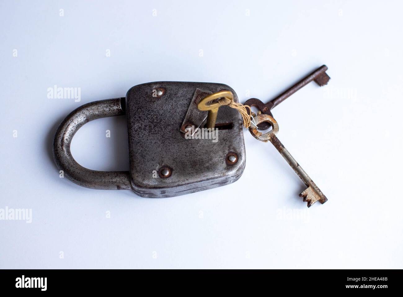 Vintage lock with three keys Stock Photo - Alamy