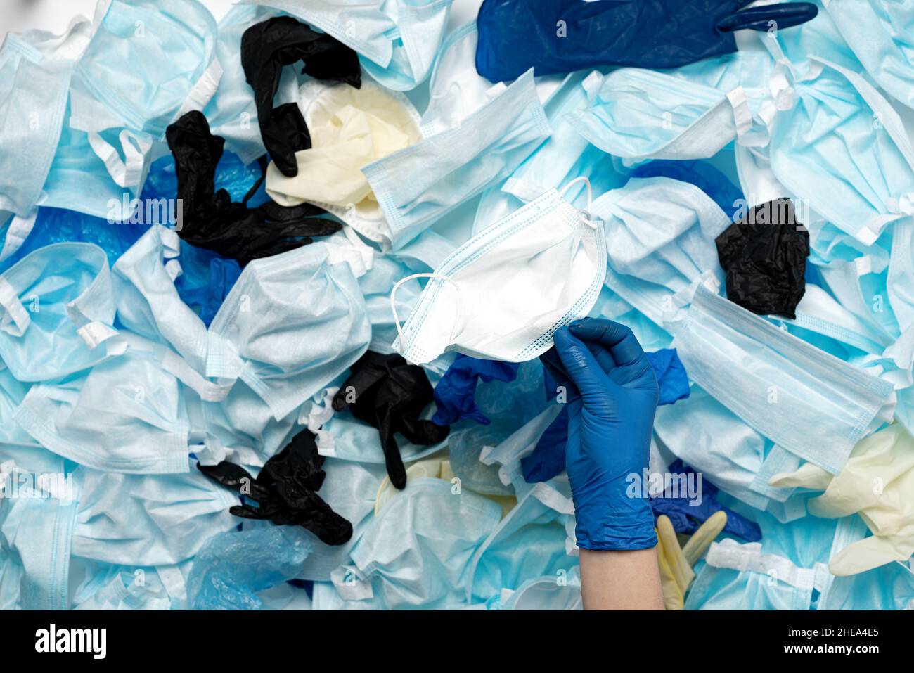 Waste of used personal protective equipment PPE, gloves, disposable ...