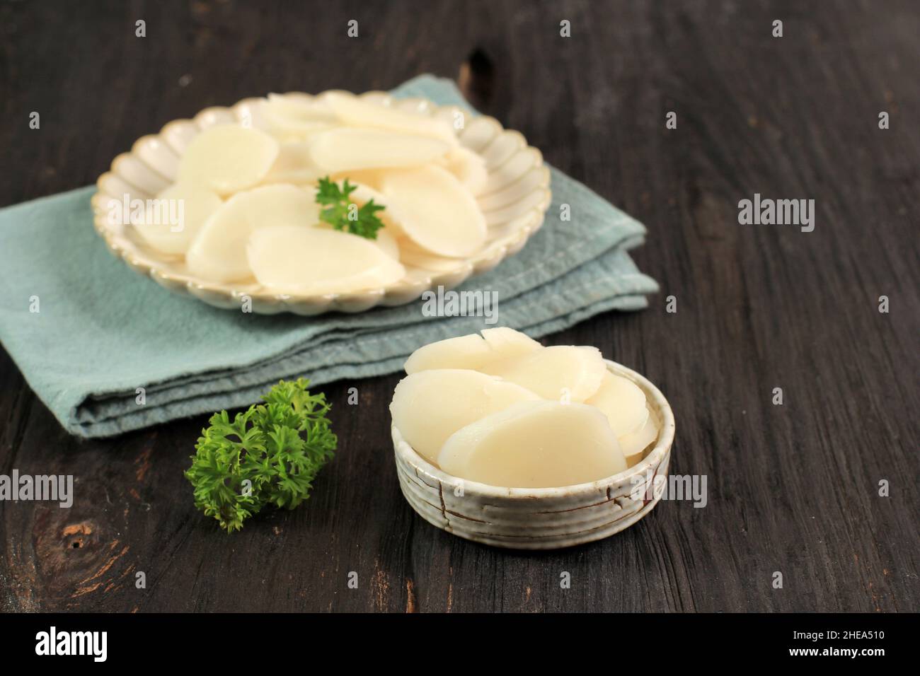Korean Food Garaetteok Bar Rice Cake, Sliced on a Plate with Black ...