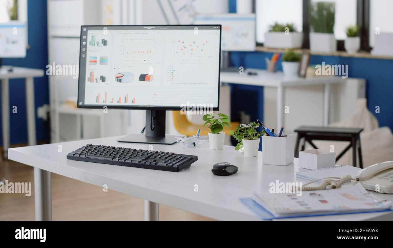 Empty business office with computer monitor on desk for corporate ...