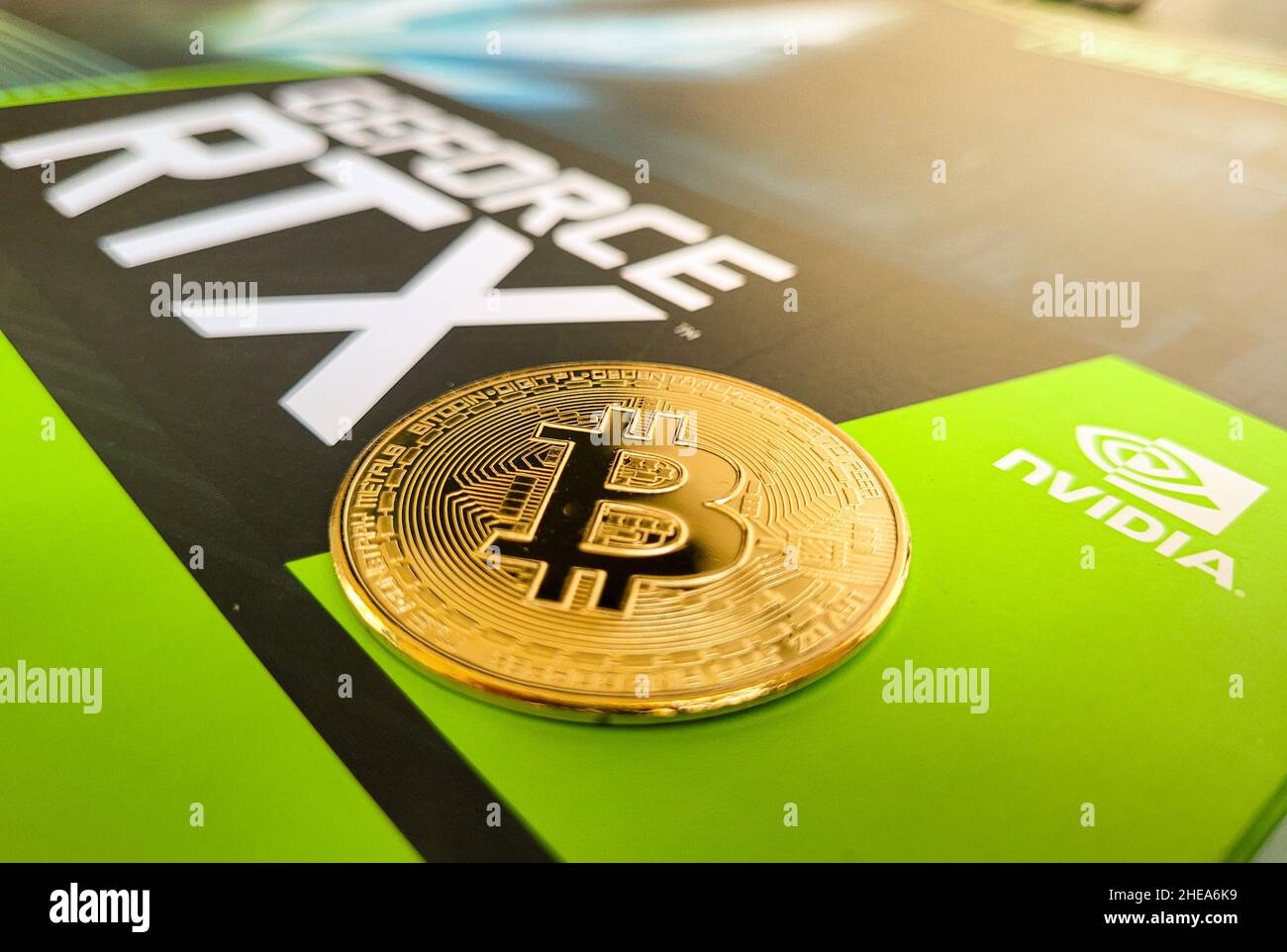 Penang, Malaysia - January 9, 2022: Golden Bitcoin token coin on a ...