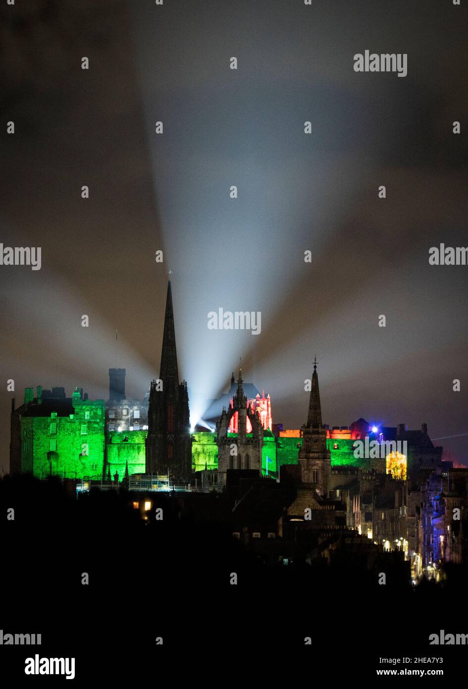 Lights from Edinburgh Castle's 'Castle of Light' event illuminate the ...