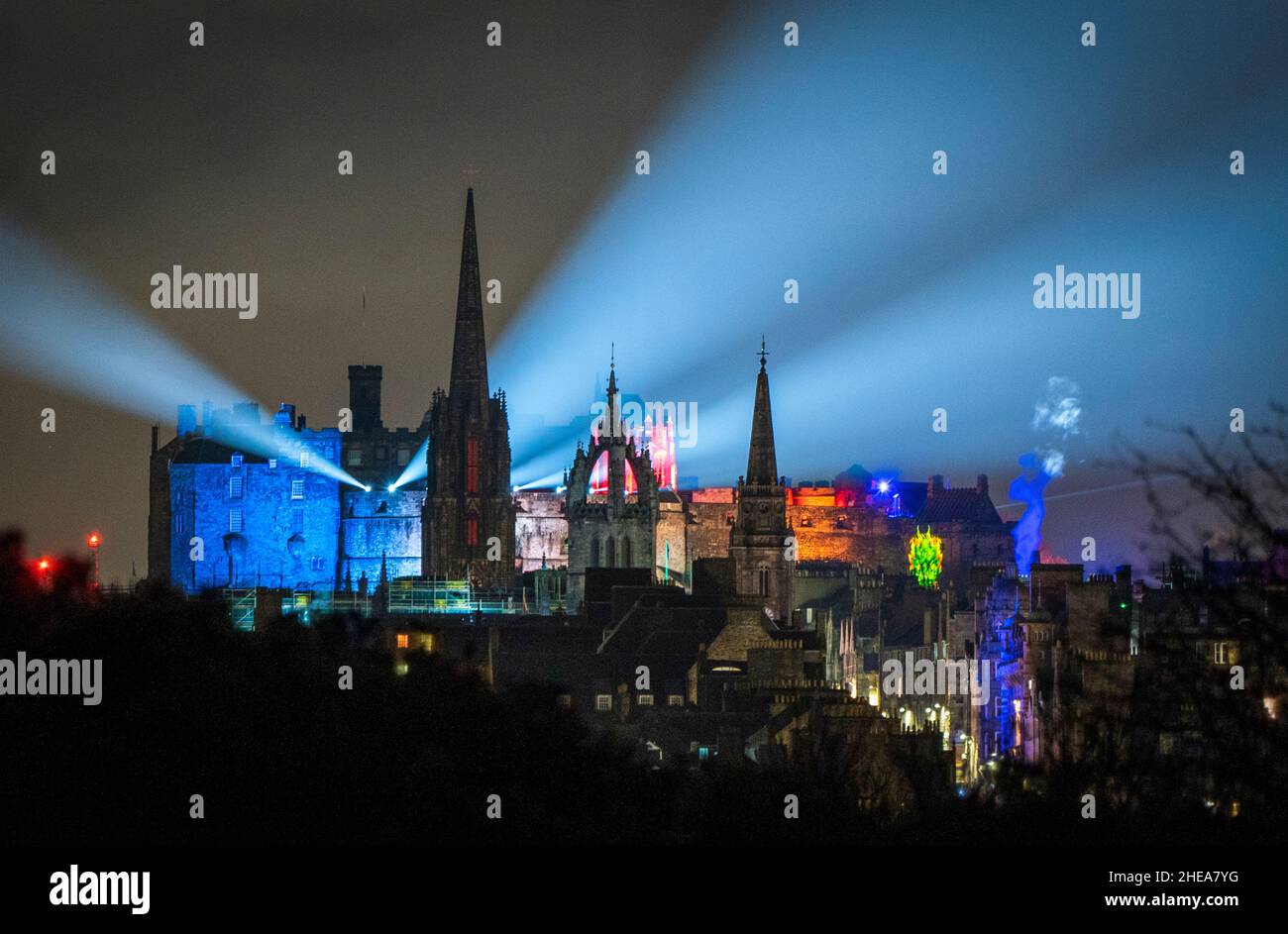 Lights from Edinburgh Castle's 'Castle of Light' event illuminate the ...