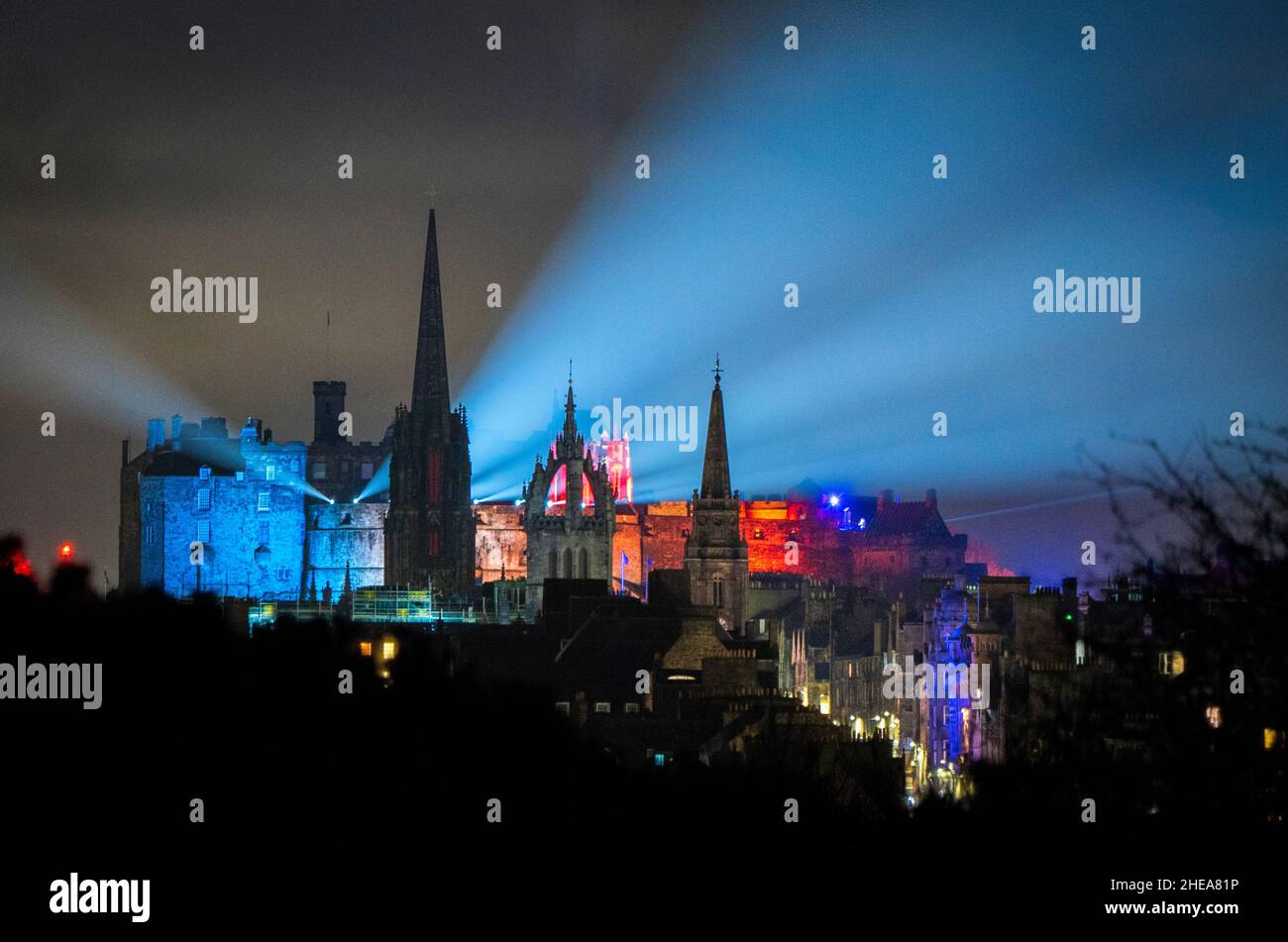 Lights from Edinburgh Castle's 'Castle of Light' event illuminate the ...