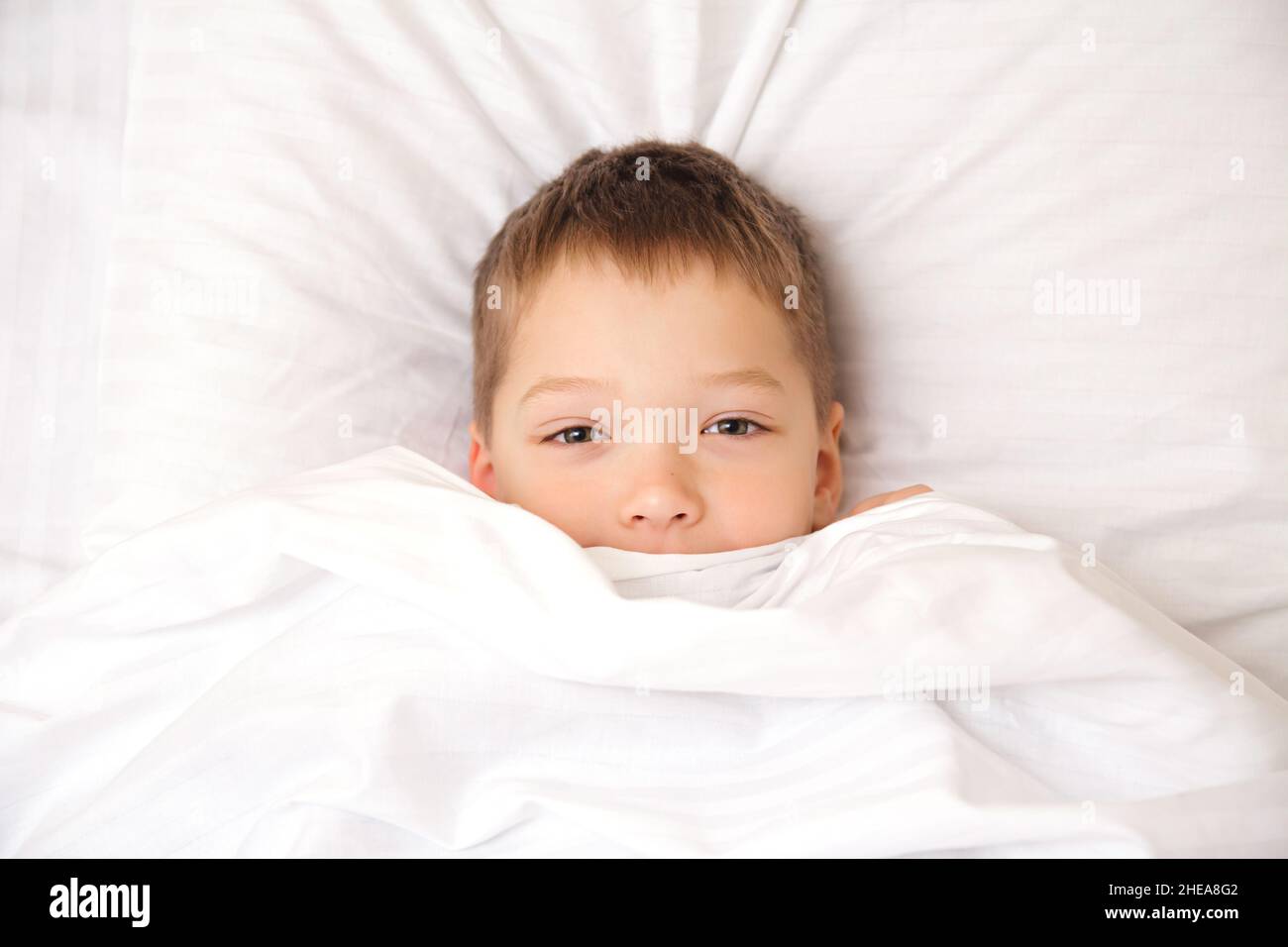 Child hide under bed hi-res stock photography and images - Alamy