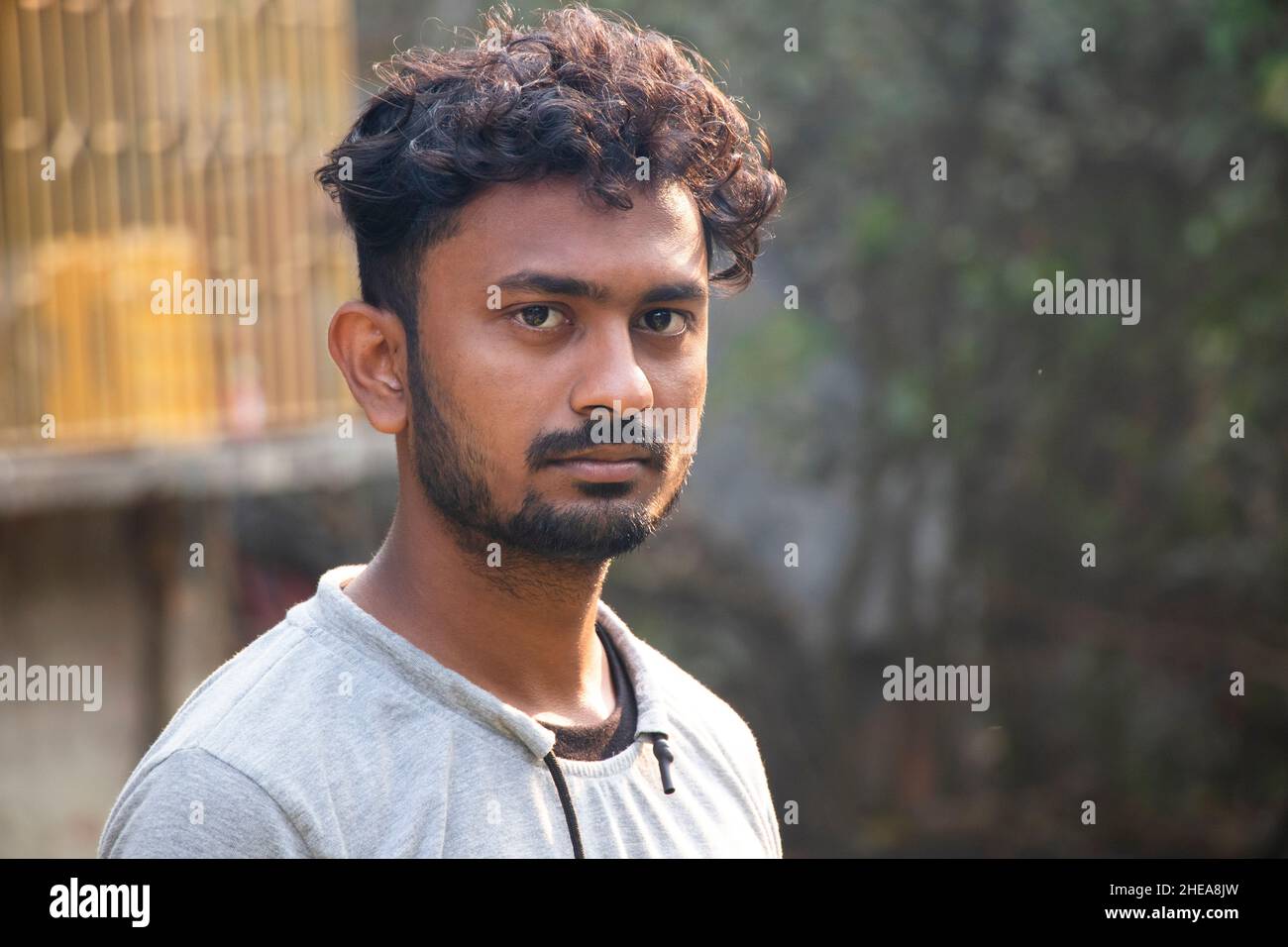 Portrait of a young Indian man in outdoor Stock Photo - Alamy