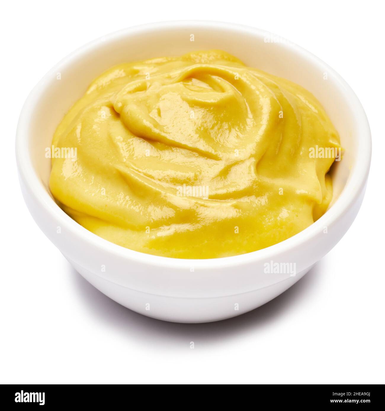 Classic mustard sauce in ceramic bowl isolated on white background ...