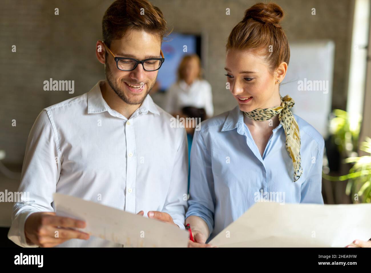 Portrait of business people having fun, working together and chatting ...