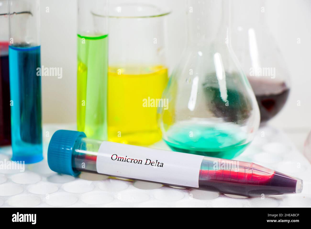Omicron Delta variation of Covid-19, blood test and medical tube ...