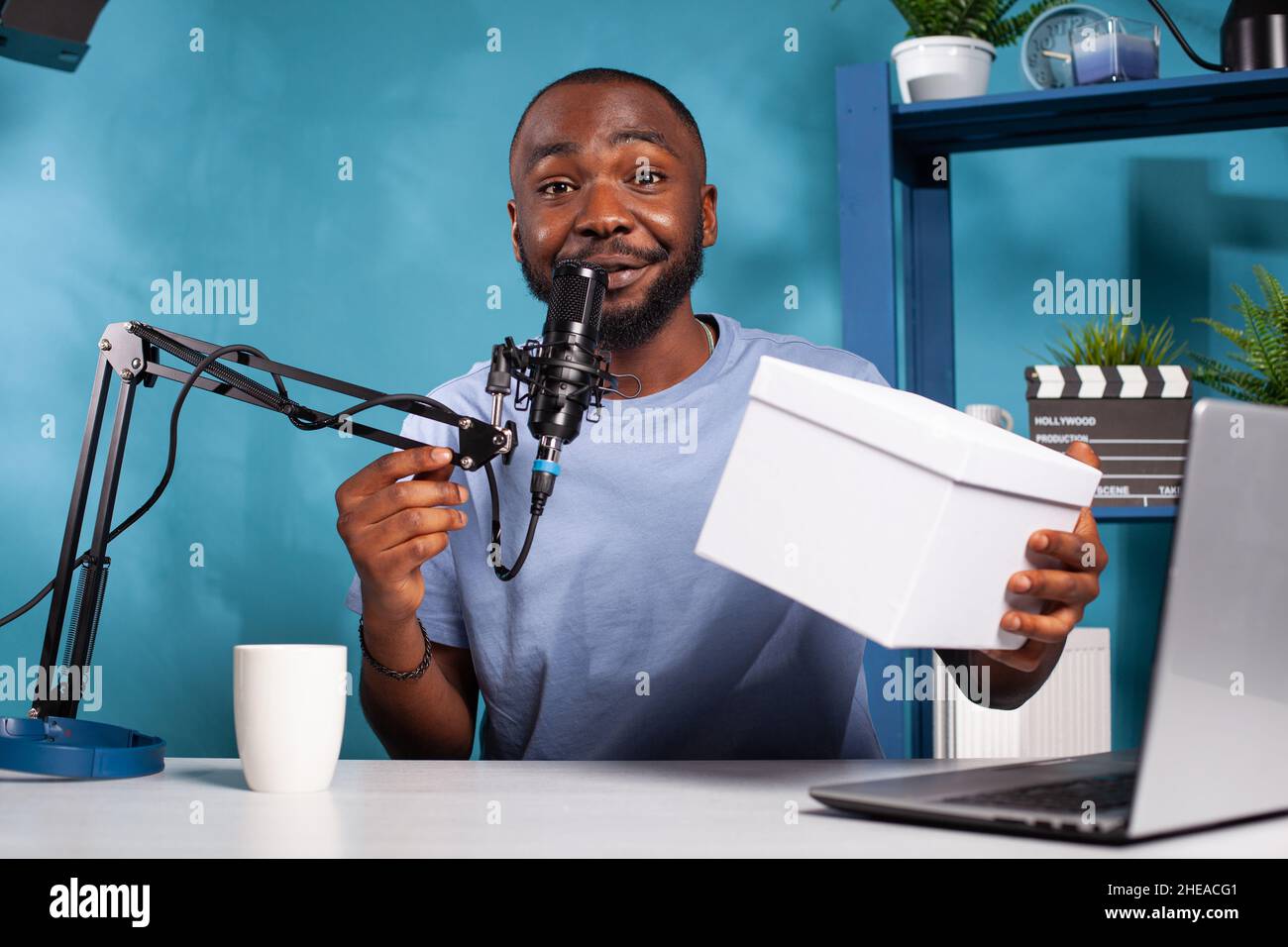 Smiling famous influencer talking into microphone announcing winners of ...