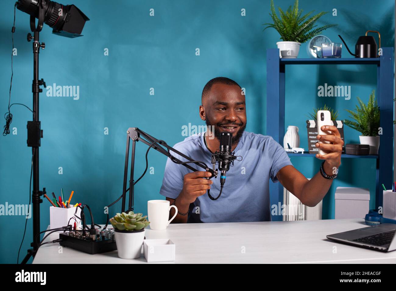 Influencer talking in mobile phone video call with fan in live ...