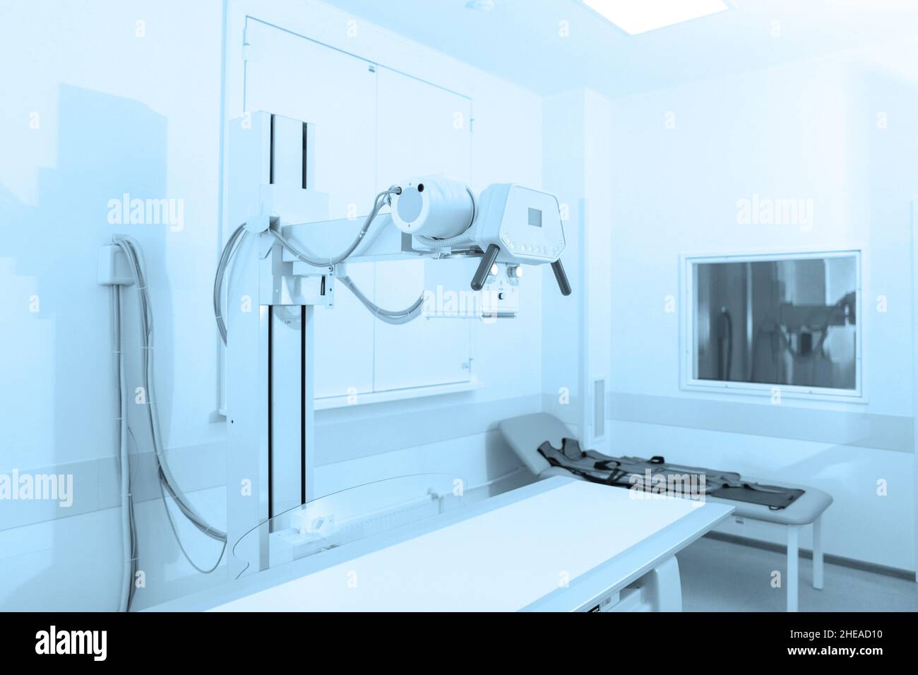 X-ray department in modern hospital. Radiology room with scan machine ...