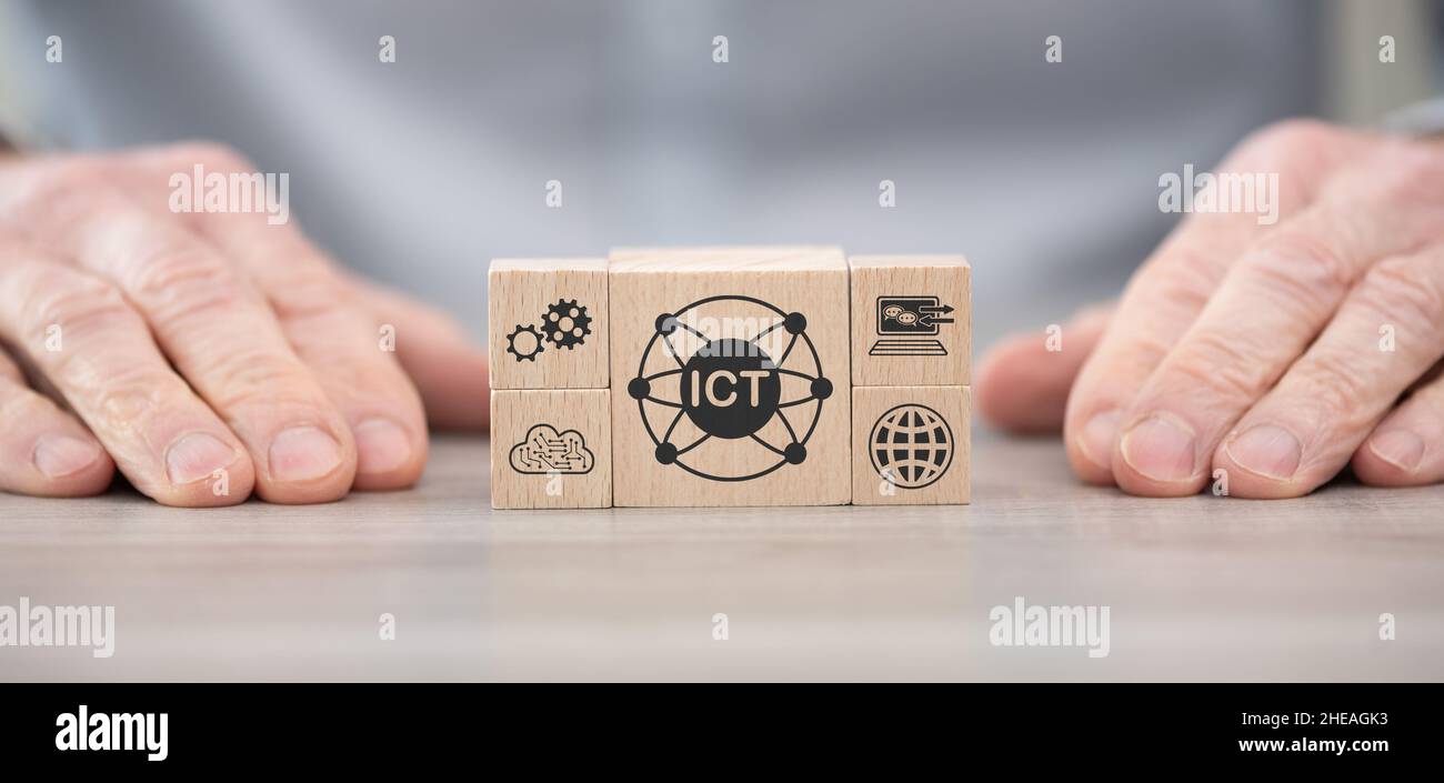 Wooden blocks with symbol of ict concept Stock Photo - Alamy