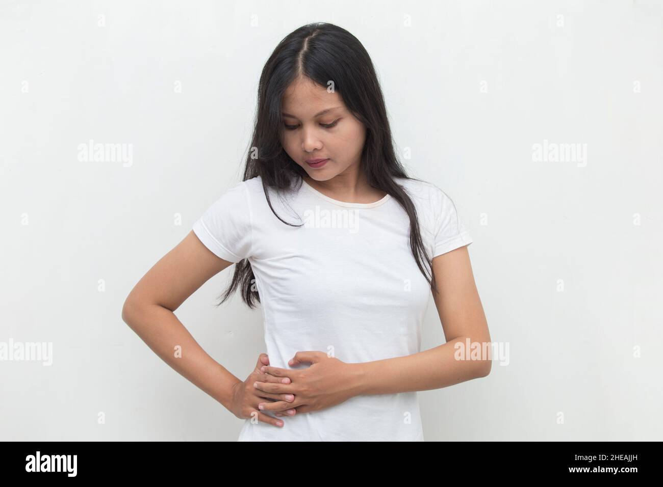 Young asian woman suffering low back pain and waist lumbar pain Stock ...