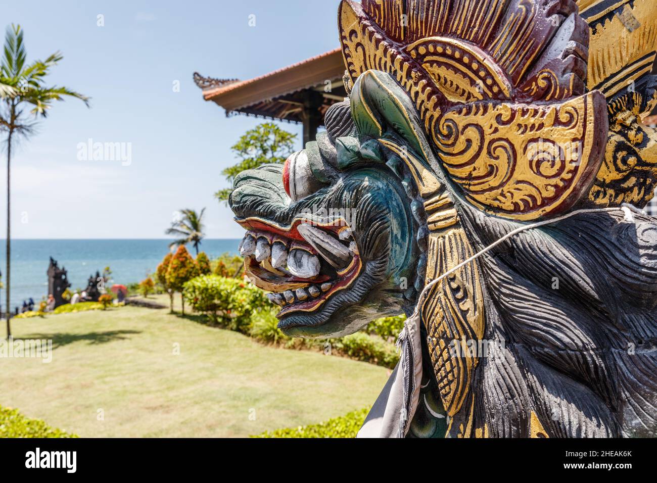 Dragon (naga) guardian statue at Balinese Hindu sea temple (Pura Segara ...