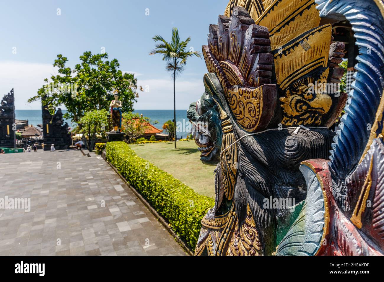 Dragon (naga) guardian statue at Balinese Hindu sea temple (Pura Segara ...