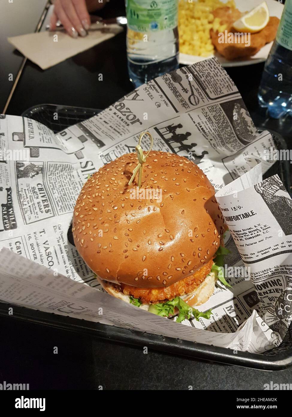 DUESSELDORF, NRW, GERMANY - NOVEMBER 11, 2019: Fresh tasty burger in an ...